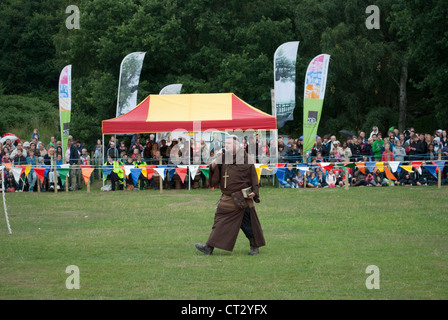 A man dressed as a medieval Friar, monk, or priest during a re ...
