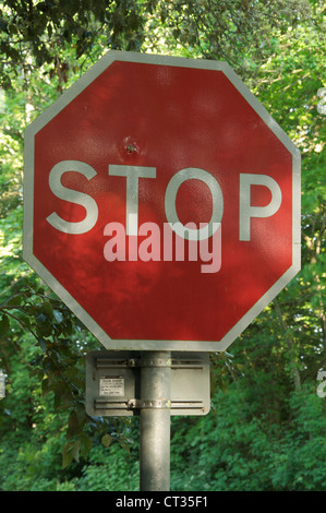 Octagonal red stop sign at a UK road junction Stock Photo: 61117036 - Alamy