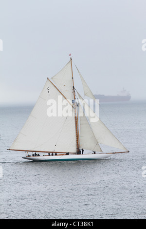 Sailing ship boom and gaff, gaff rigged, with furled sail and masts ...