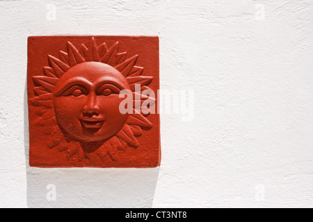 Terracotta sun face Stock Photo - Alamy