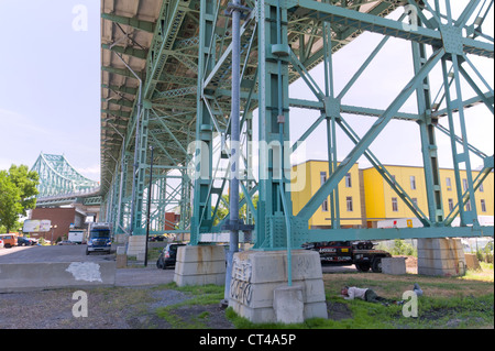 homeless man sleeping under a bridge Stock Photo - Alamy