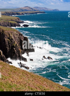 The waves crashing into the cliffs, this is the Dingle Peninsula on ...