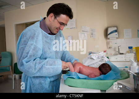 NEWBORN BABY BEING MASSAGED Stock Photo - Alamy