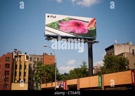 Advertising for the Apple Inc. iPad on a billboard in Midtown Manhattan ...