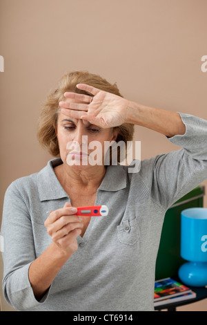 FEVER IN AN ELDERLY PERSON Stock Photo - Alamy