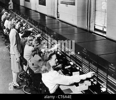 Telephone operator working at switchboard Stock Photo - Alamy