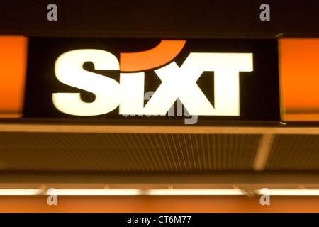 Sixt company logo at the car rental desk of Sixt AG at Munich Airport ...