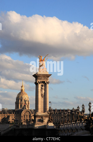 Pont Alexandre III and Les Invalides at night illumination in Paris ...