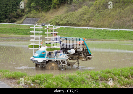 Rice planting machine common in rural Japanese agriculture Stock Photo ...