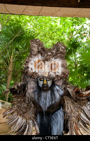 A Maya dancer in owl costume at the Riviera Maya's Xcaret Park in ...