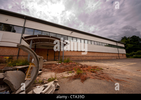 Boarded up commercial property warehouse Stock Photo - Alamy