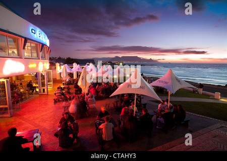 People on Terrace of Blue Peter Restaurant and Hotel at Bloubergstrand ...