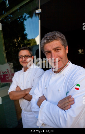Folded hands on the top of a bar table. Shot in ultraviolet light Stock ...
