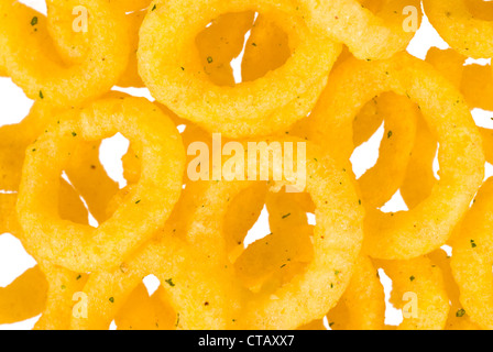Crunchy maize ring snacks with onion flavor Stock Photo - Alamy