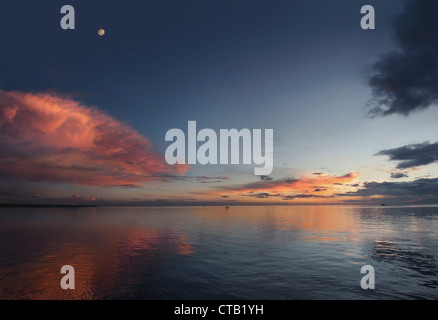 sunset over the cloud Stock Photo - Alamy