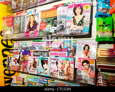 Magazines on shelves in a newsagents in Britain UK Stock Photo - Alamy