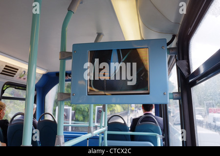 Digital bus advertising screen, upstairs on a London bus in UK Stock ...