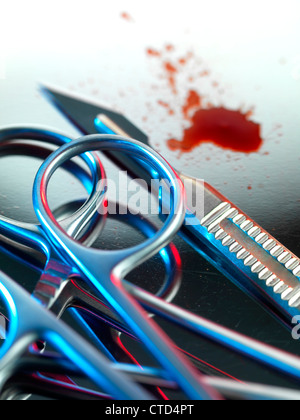 Surgery, bloody medical instruments and dirty operating room concept ...