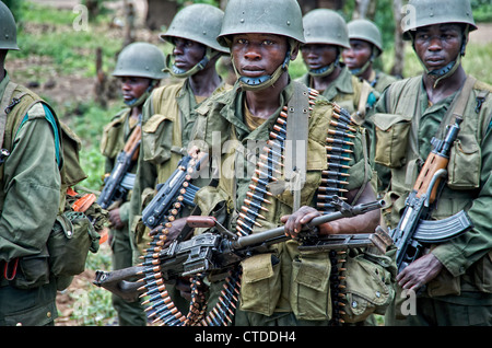 Armed FARDC Government Congolese soldiers stand guard in an IDP ...