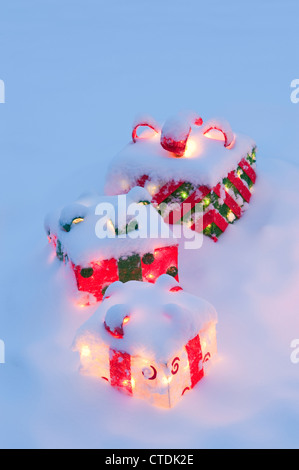 Christmas Presents On Snow Stock Photo - Alamy