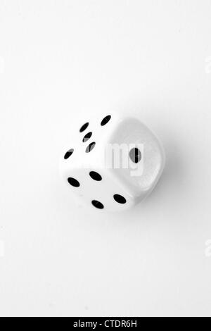 Dice In Motion Stock Photo - Alamy