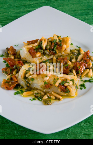 grilled fish with pine nuts Stock Photo - Alamy