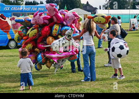 Balloon seller selling her balloons at Lloyd Park in Croydon Surrey ...