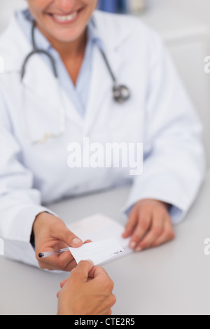 Woman doctor with paper notepad Stock Photo - Alamy