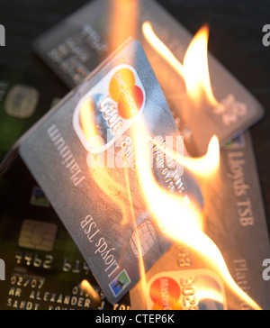 burning credit card Stock Photo - Alamy