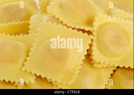 Dry ravioli pasta on white background Stock Photo - Alamy