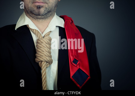 Depressed man with a noose around his neck Stock Photo: 129188386 - Alamy