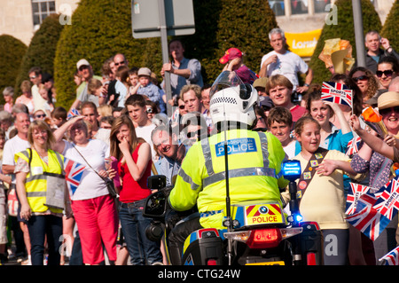 Crowd cheering with Union Jack in hand, UK Stock Photo - Alamy