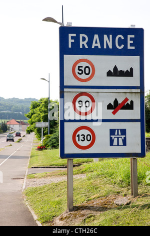 Luxembourg road sign with the speed limits, crossing frontier to the ...