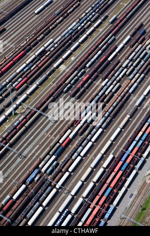 A vertical aerial shot of a freight train going through Banff National ...