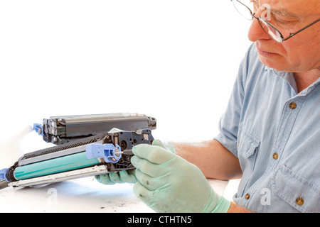 worker Laser printer on a workbench. Printer workshop Stock Photo - Alamy
