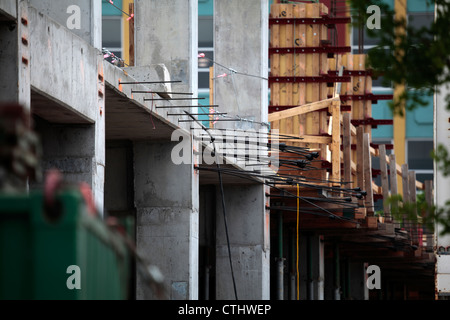 Post tensioning cables protruding from end of concrete structure Stock ...