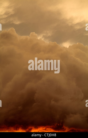 Stunning sunset with clouds lit by the setting sun, highlighting the ...