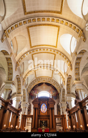 Interior of St. Bride's Church, London. Ornate architecture, statues ...