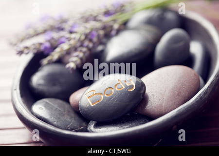 Volcanic hot stone massage stones on the white background Stock Photo ...