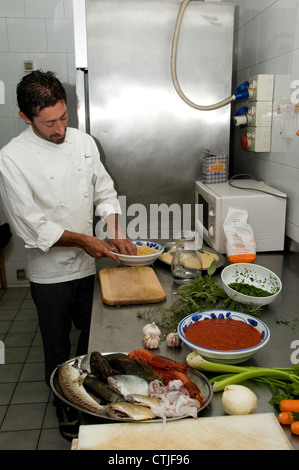 Chef Mimmo preparing his famous Sicilian couscous Stock Photo - Alamy