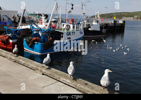 Small fishing boats in Largs Harbour on the Firth of Clyde in North ...