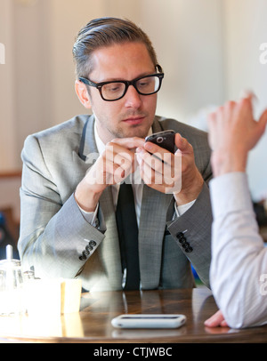 Using smart phone Stock Photo - Alamy