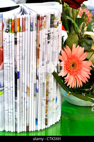 Pile of colorful magazines on a table Stock Photo - Alamy