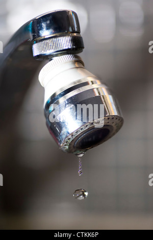Old kitchen tap dripping Stock Photo - Alamy