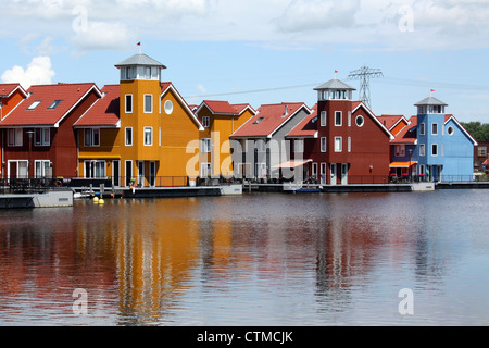 The colorful houses in Reitdiephaven in Groningen Netherlands as a long ...