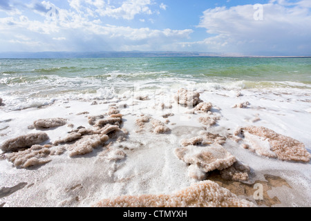 Salt on the beach of the dead sea in Israel border with Jordan Stock ...