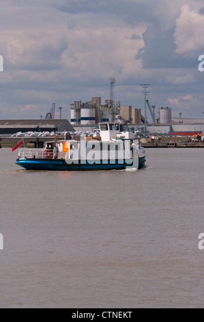 A passenger on the Tilbury Gravesend ferry crossing the River Thames ...
