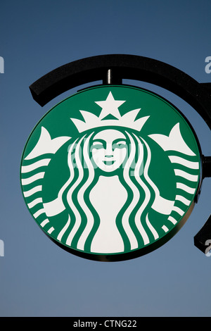 Starbucks sign against a blue sky Stock Photo - Alamy