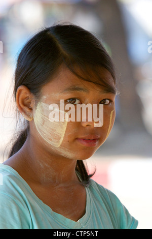 Portrait of a Burmese girl wearing thanaka on her cheeks in (Rangoon ...