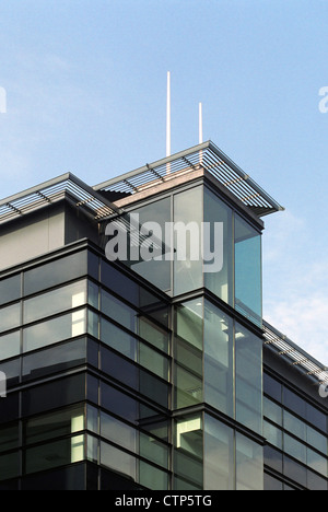 Modern office building facade close-up with minimalist vertical frames ...